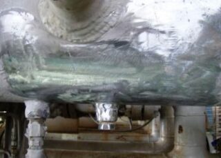 Composite Mends Pinhole Leak on a Topside Weldolet